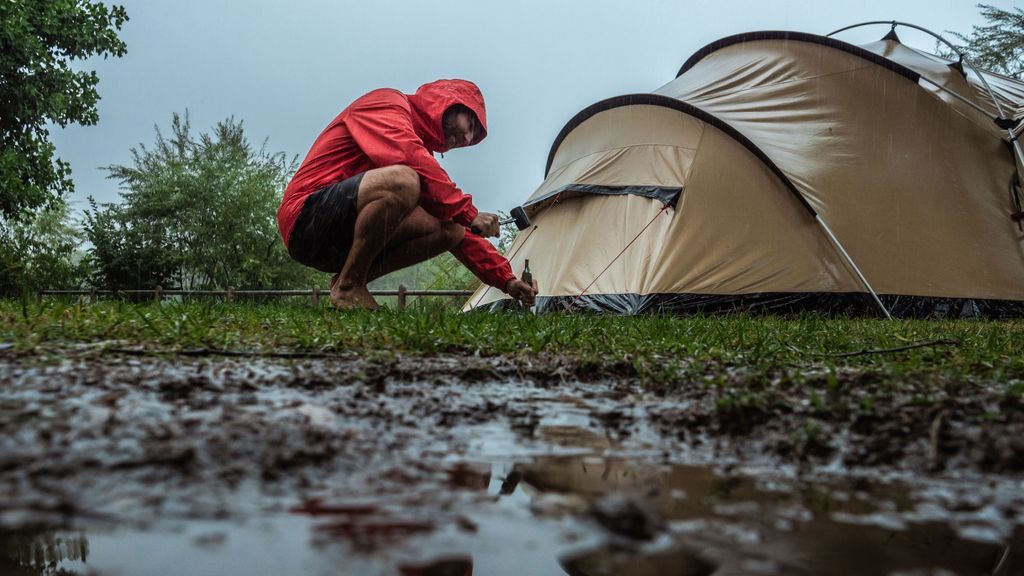 How to pitch a tent in the rain: our top tips on wet weather pitching ...