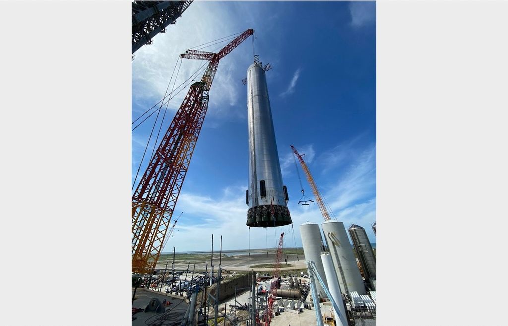 SpaceX lifts huge Super Heavy rocket onto launch stand (photos) | Space