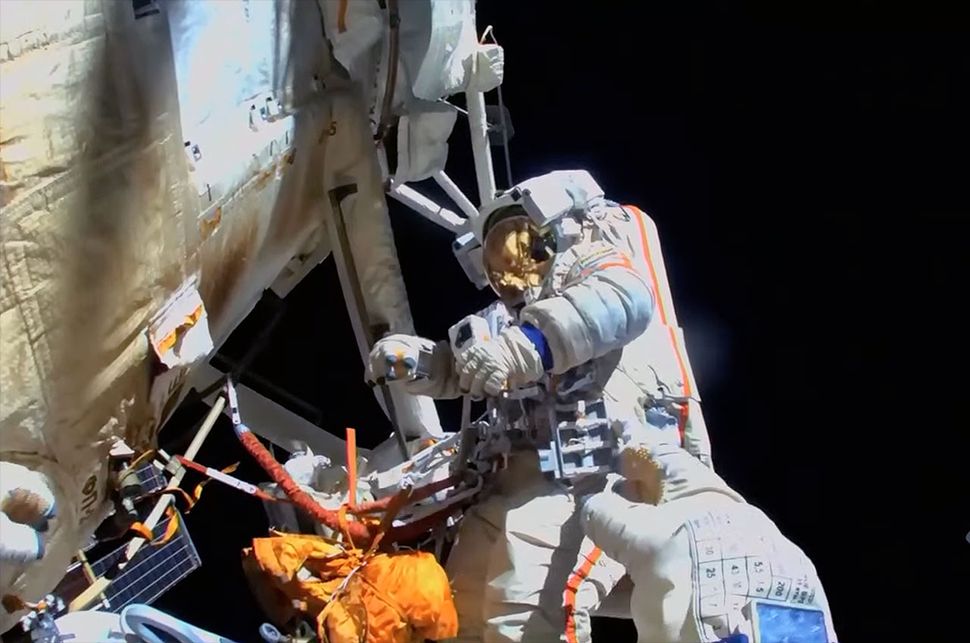 Russian cosmonauts relocate airlock on International Space Station ...