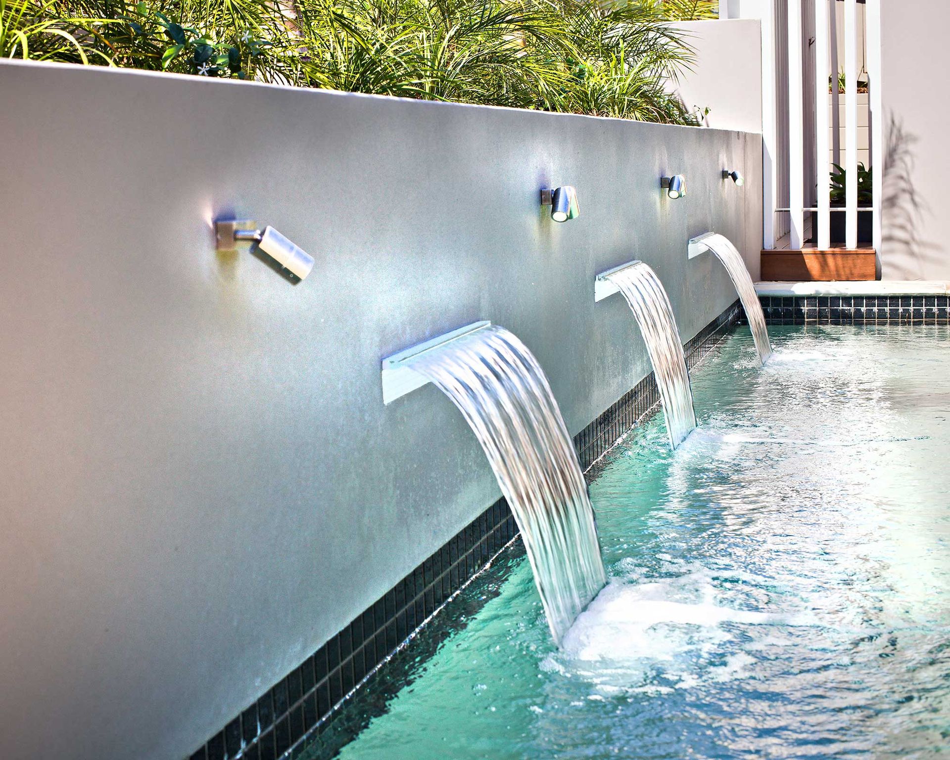 Pool waterfall ideas: 10 looks to elevate your swimming pool | Gardeningetc