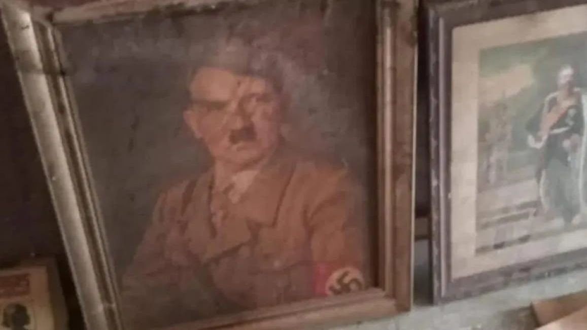 History teacher finds secret cache of Nazi artifacts hidden behind ...