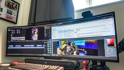 I ditched my dual monitor setup for this ultrawide OLED monitor — and ...
