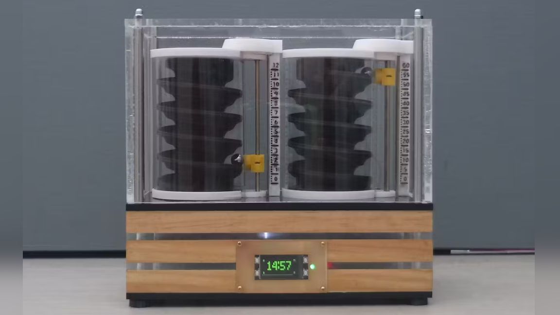 This Raspberry Pi Pico marble clock displays the time using magnets ...