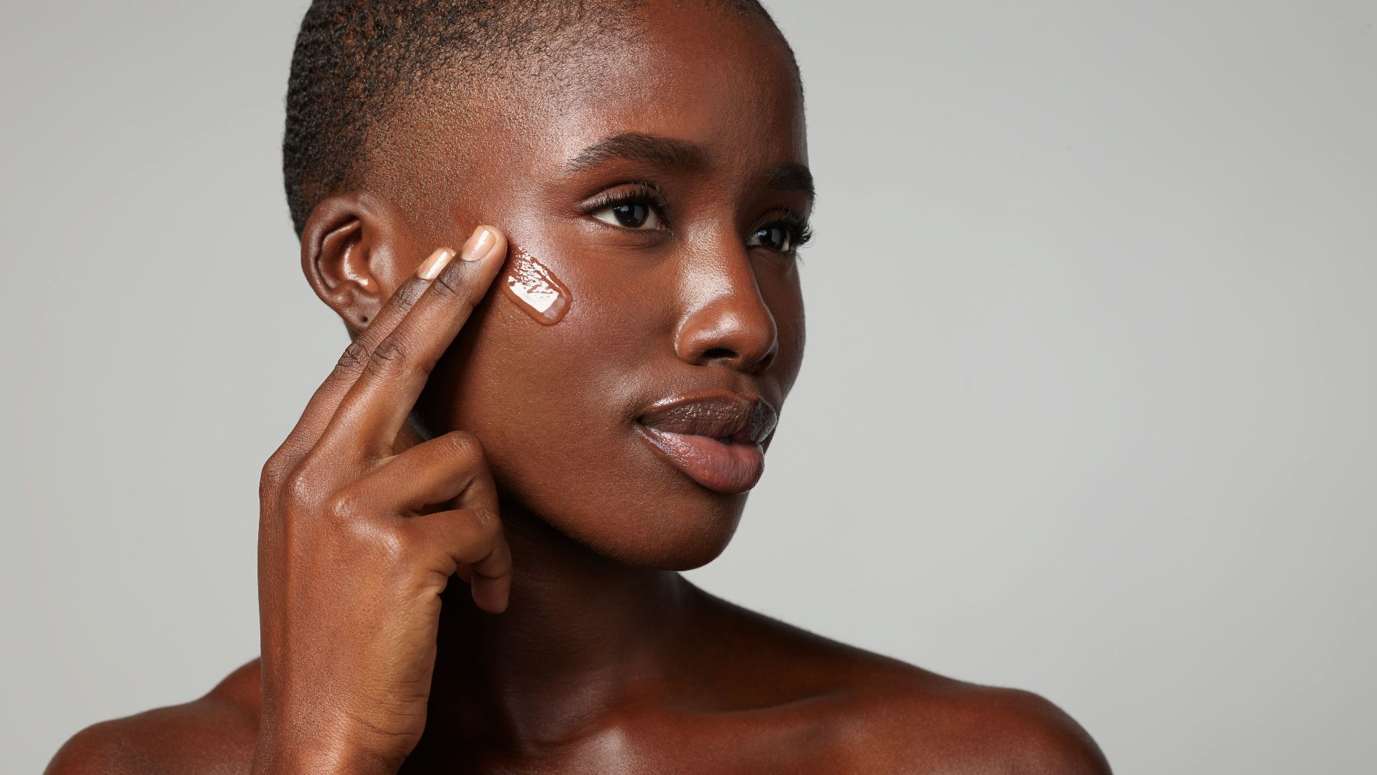 Everything you need to know about clear SPF, according to a doctor ...