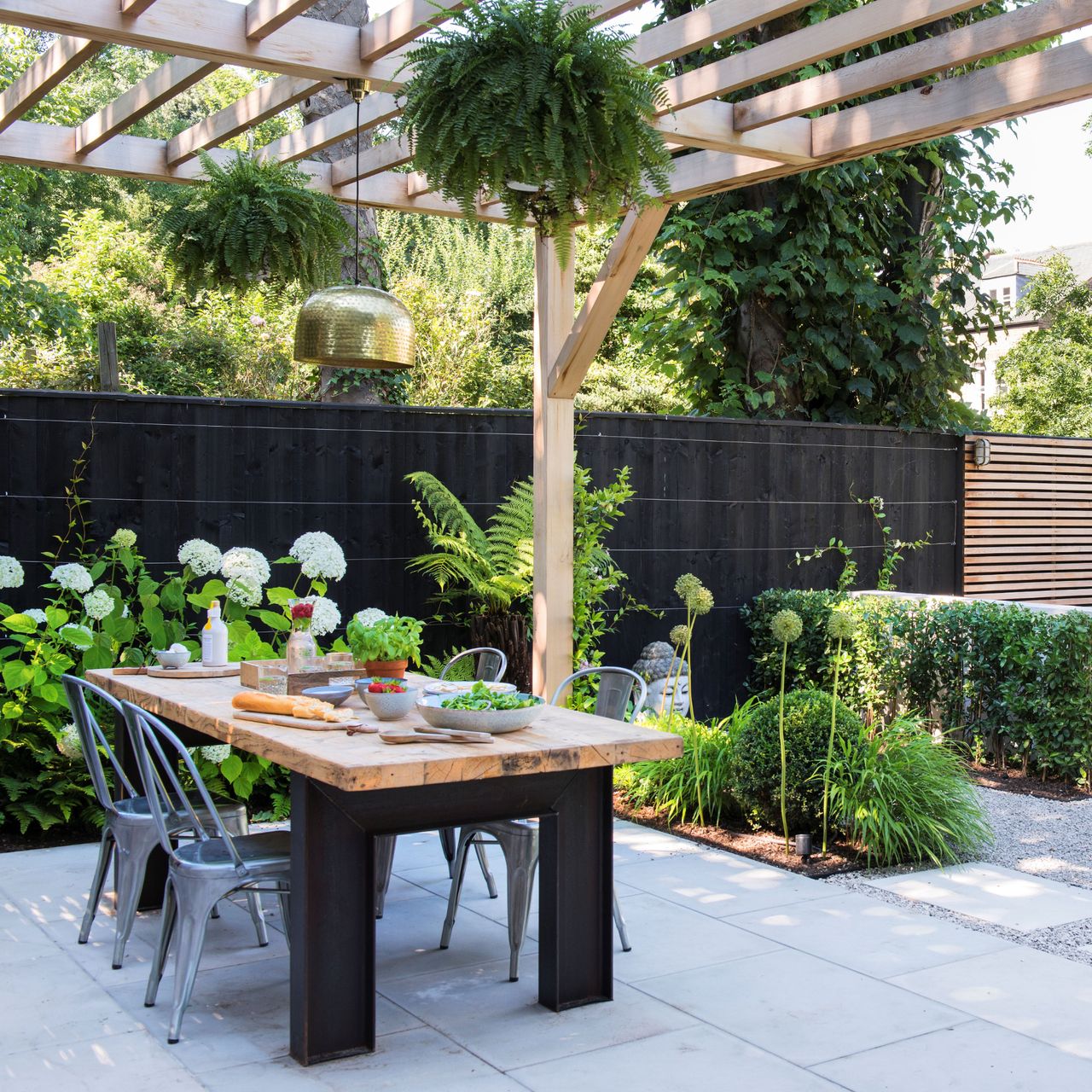 How to remove moss from a patio: 5 methods experts swear by | Ideal Home