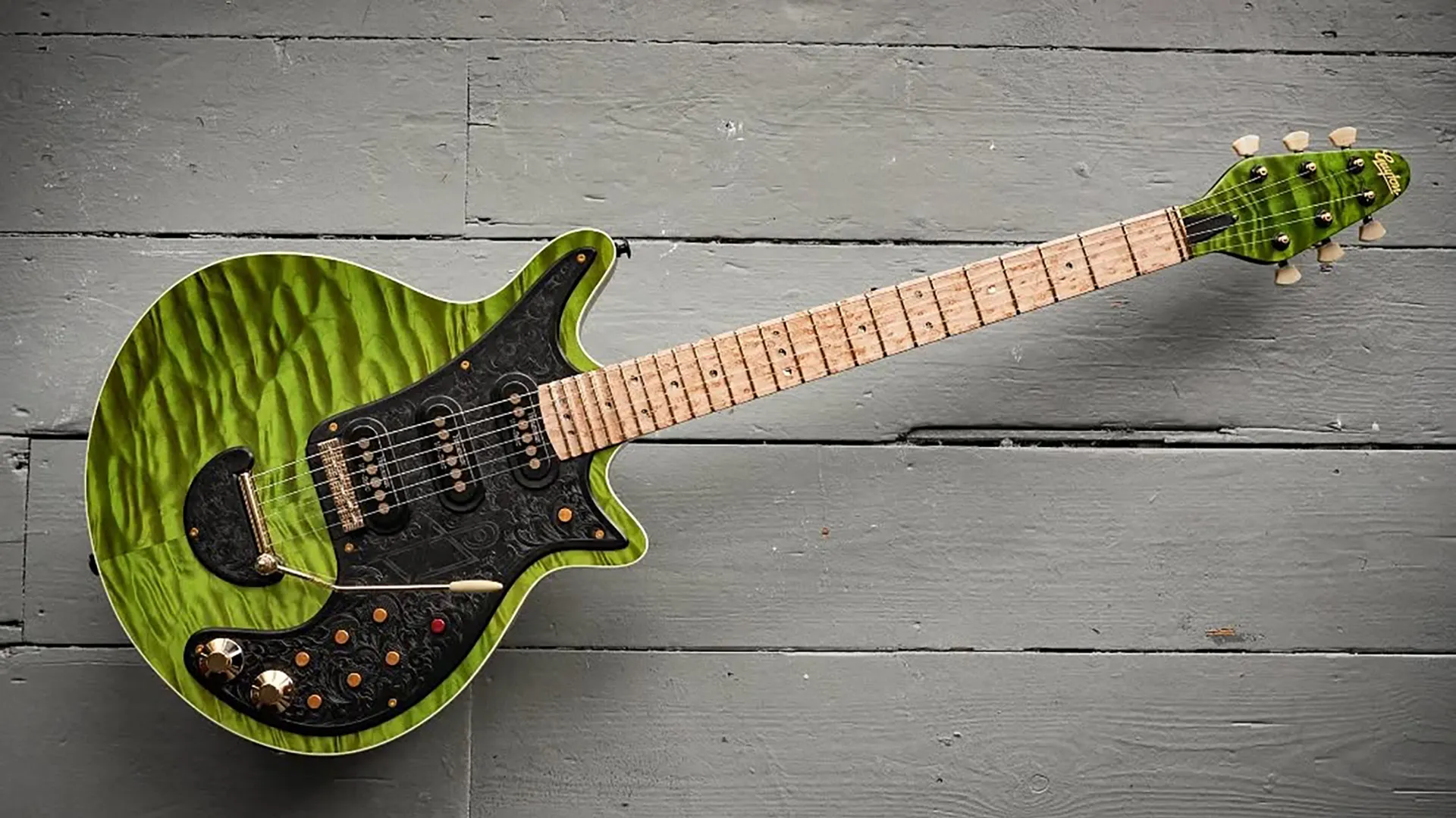 The Steve Vai Red Special (except it's green). Yup Steve has a Brian ...