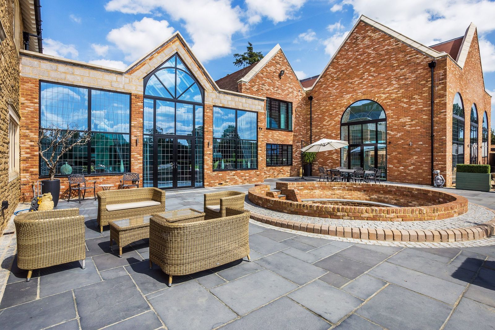 An extravagant Surrey mansion with a helipad, an American diner and a ...