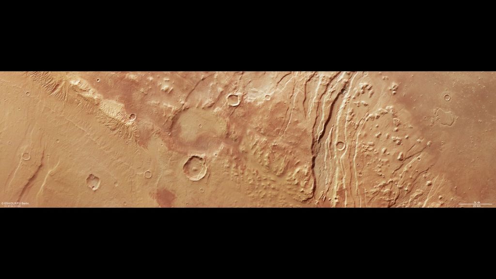 Mars orbiter looks deep into chasms and valleys on the Martian surface ...