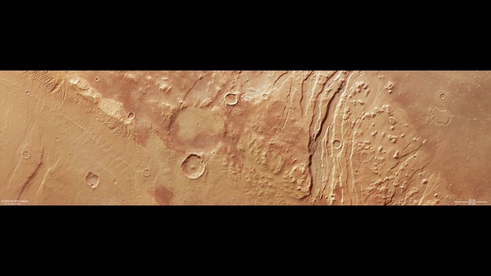 Mars orbiter looks deep into chasms and valleys on the Martian surface ...