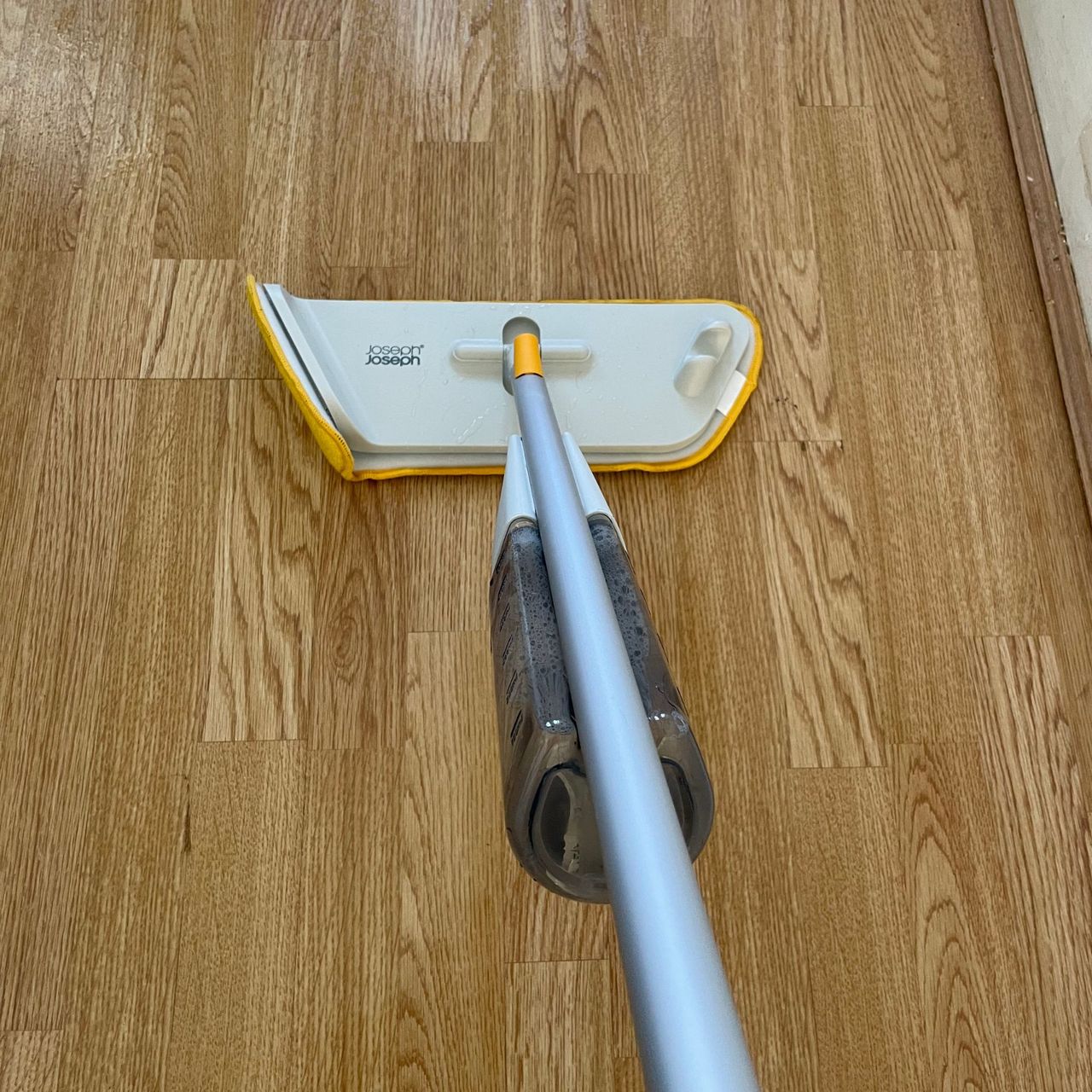 Is it better to vacuum or mop first? What the experts say | Ideal Home
