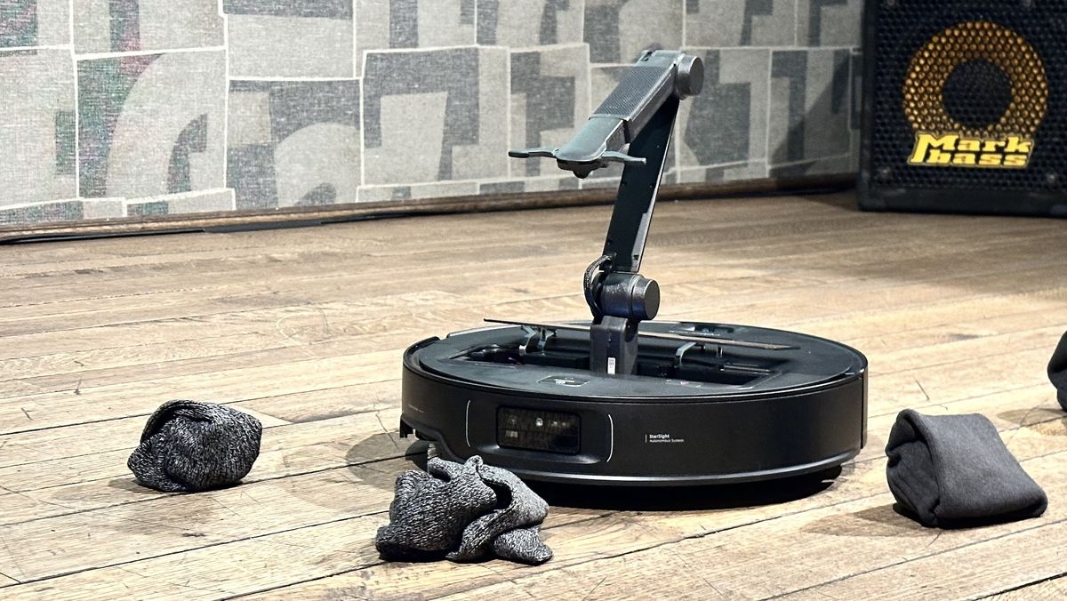 This new robot vacuum has a robotic arm that can pick up your socks ...
