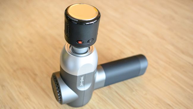 I tried this budget-friendly heated massage gun on my sore muscles – 5 ...