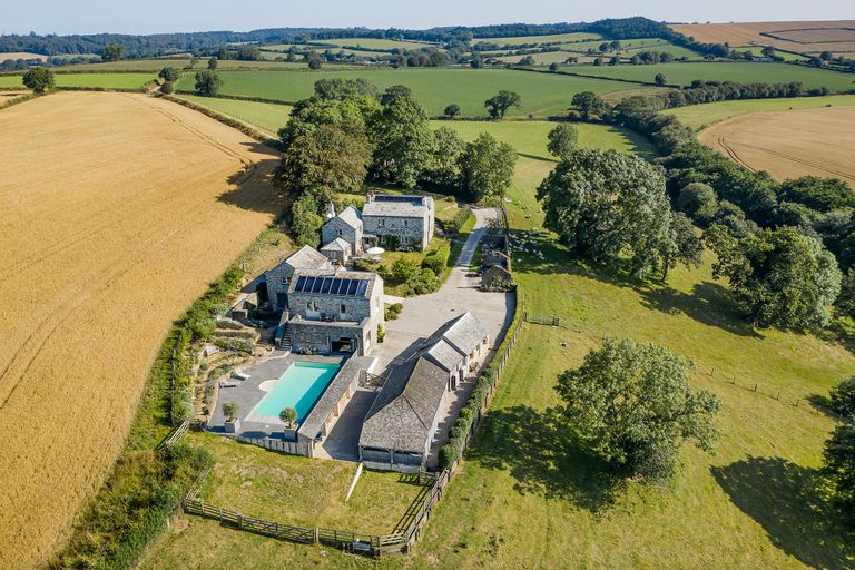 A Cornwall farmhouse that's full of stone-built charm outside, and ...