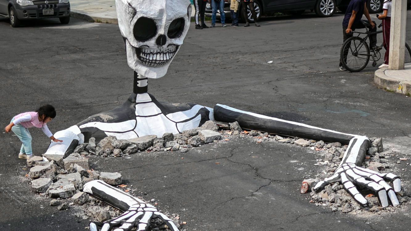 Giant skeleton sculptures 'rise up' in Mexico City | Creative Bloq