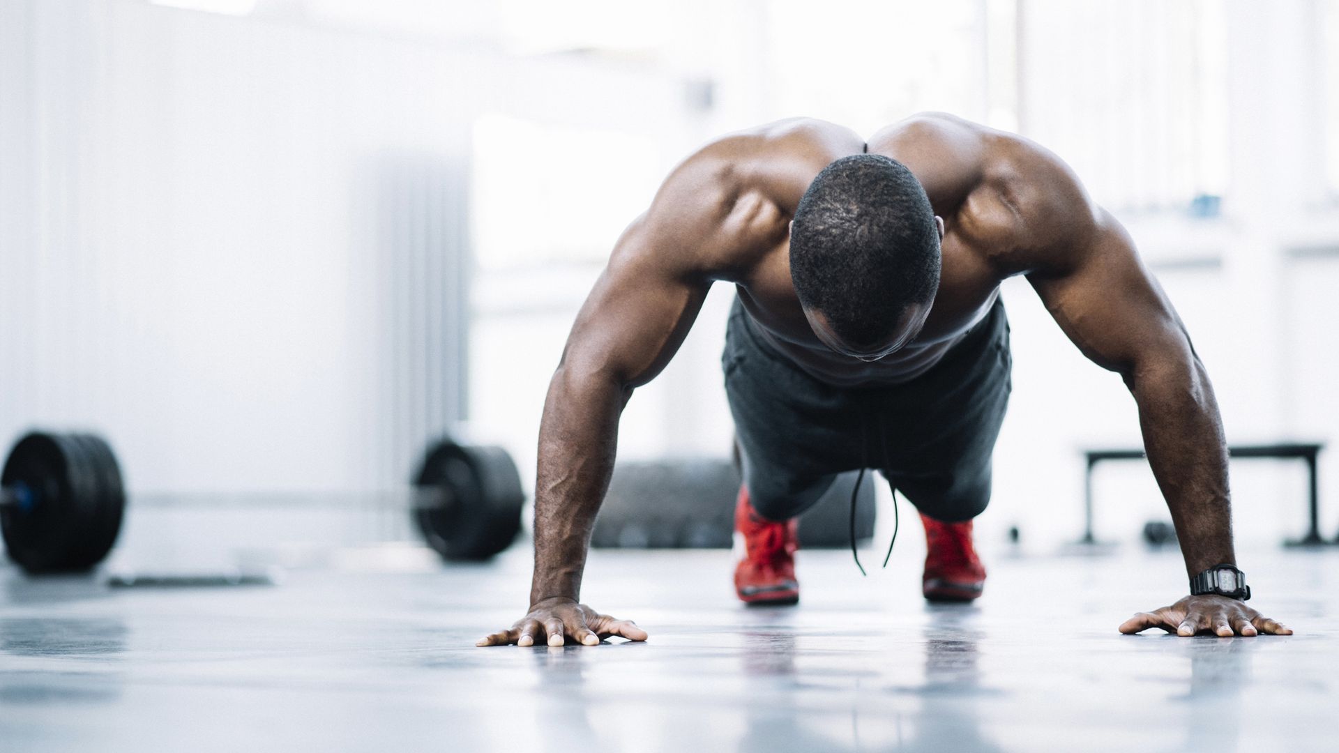 Get big arms and broad pecs with push ups by following these workout ...
