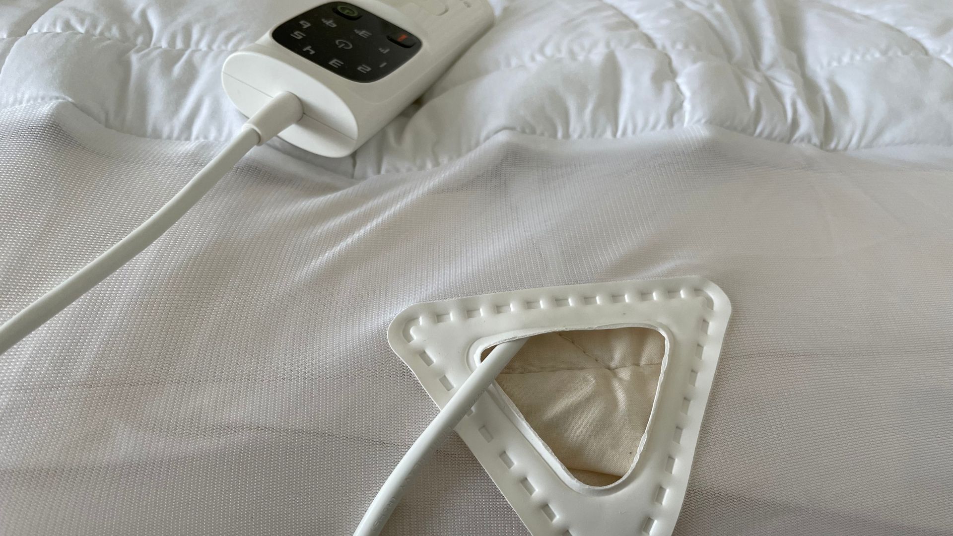 Dreamland Snowed In Organic Cotton Warming Mattress Protector review | Woman & Home