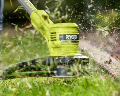 How to use a weed eater: expert tips to get a neat lawn | Gardeningetc