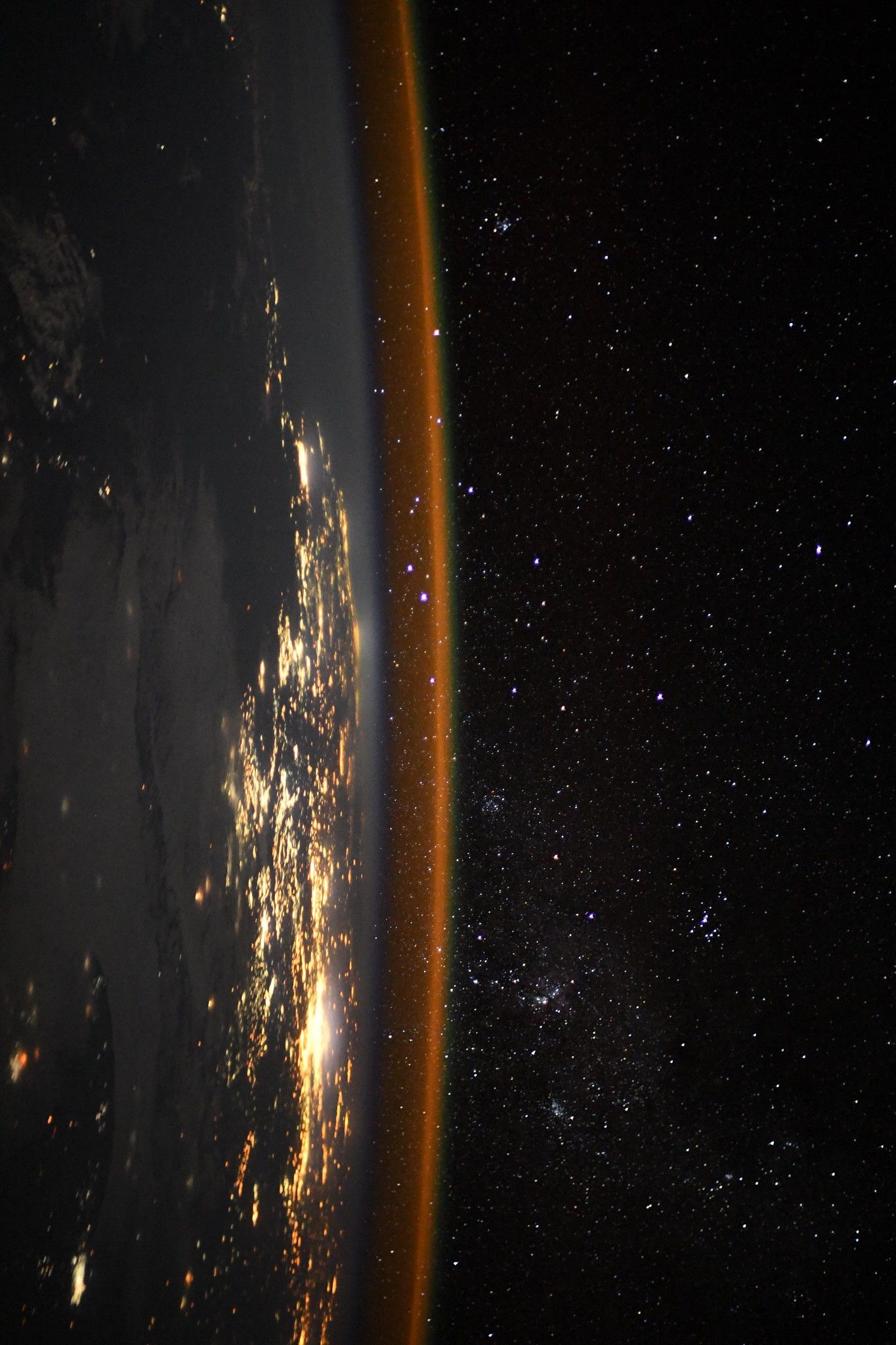 The world turns sideways in trippy, glowing Earth photo from the ...
