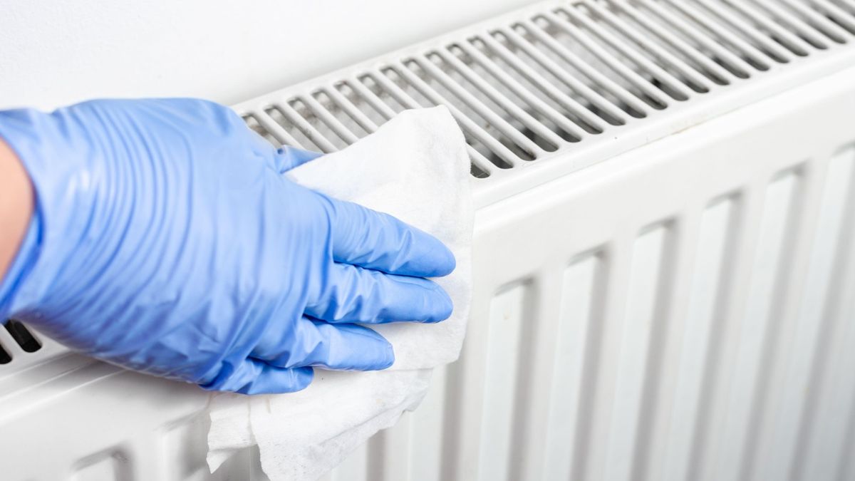 Easy and cheap hack to clean the pesky dust behind radiators | GoodtoKnow