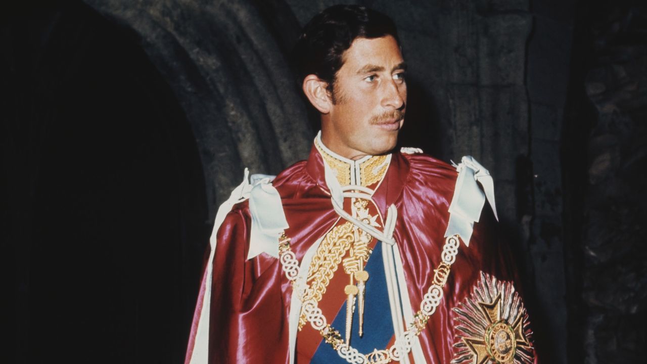 King Charles with a wispy mustache and cape is so unique | Woman & Home