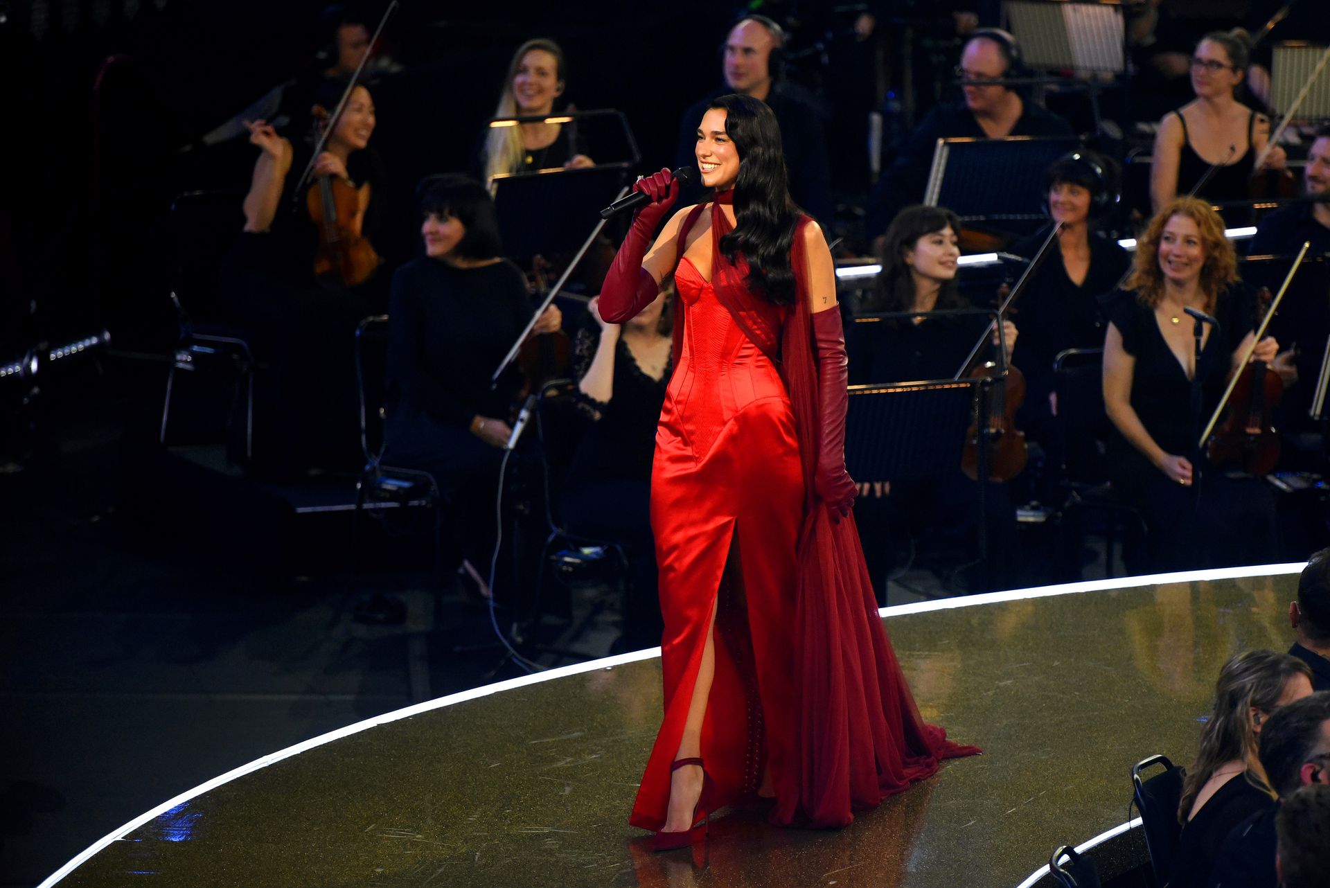 Dua Lipa Pours Herself Into a Cherry Red Corset Gown at Her Intimate ...