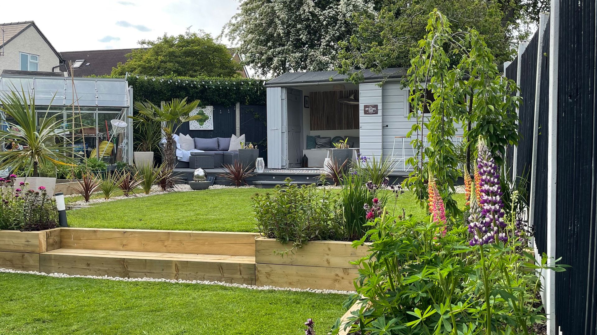 Can you water grass in the sun? Experts explain | Ideal Home