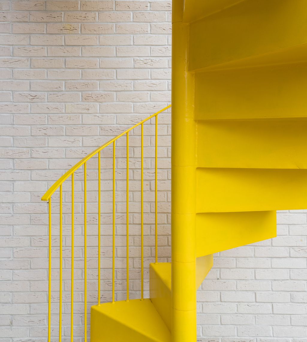 East London apartment with yellow spiral staircase | Wallpaper*