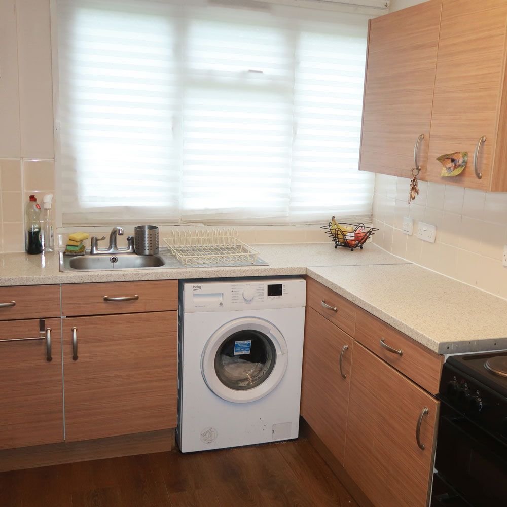 See how a savvy DIY-er transformed a dull, wooden kitchen with £3 paint ...