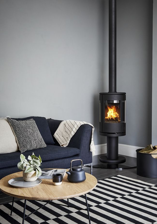 Corner log burner ideas for a cosy living space | Homebuilding