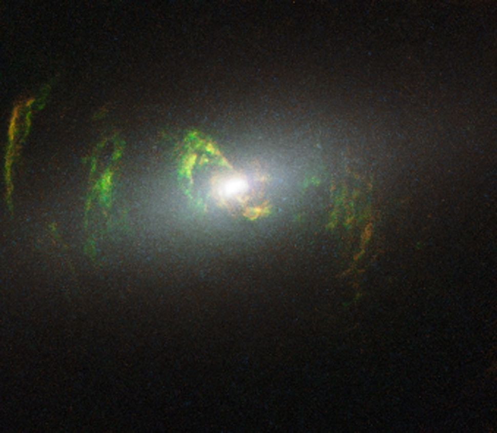 Glowing Green Space Cloud Photos by the Hubble Space Telescope | Space