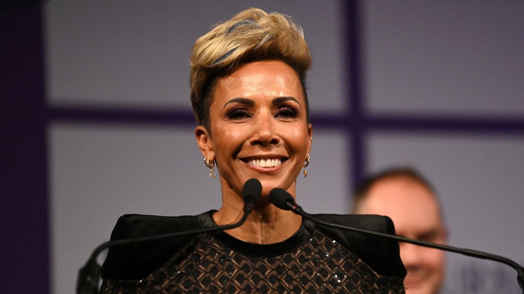 Dame Kelly Holmes stuns in a man's suit, showcasing the power of ...