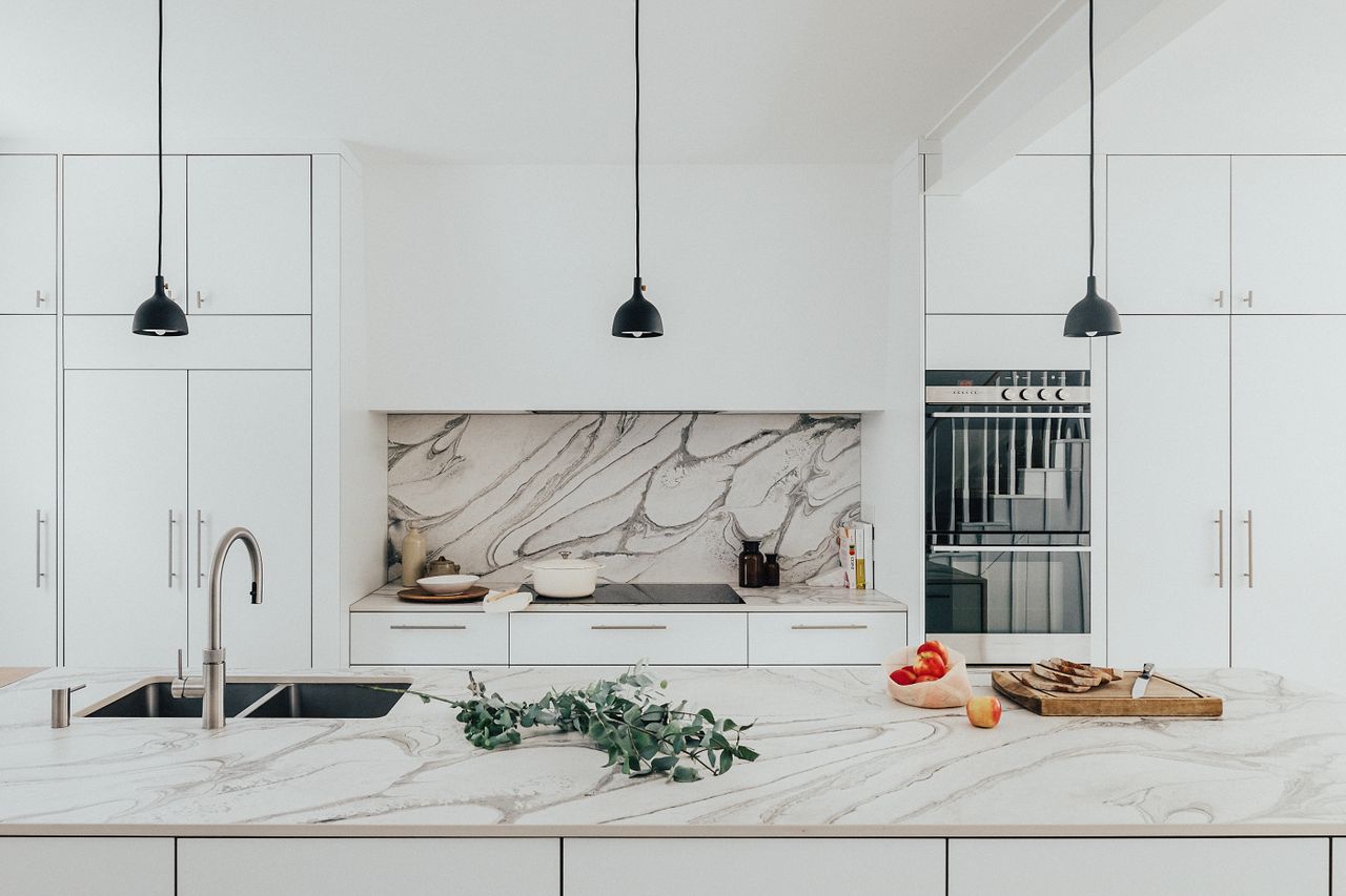 This warm minimalist kitchen is a masterclass in adding soul to white ...