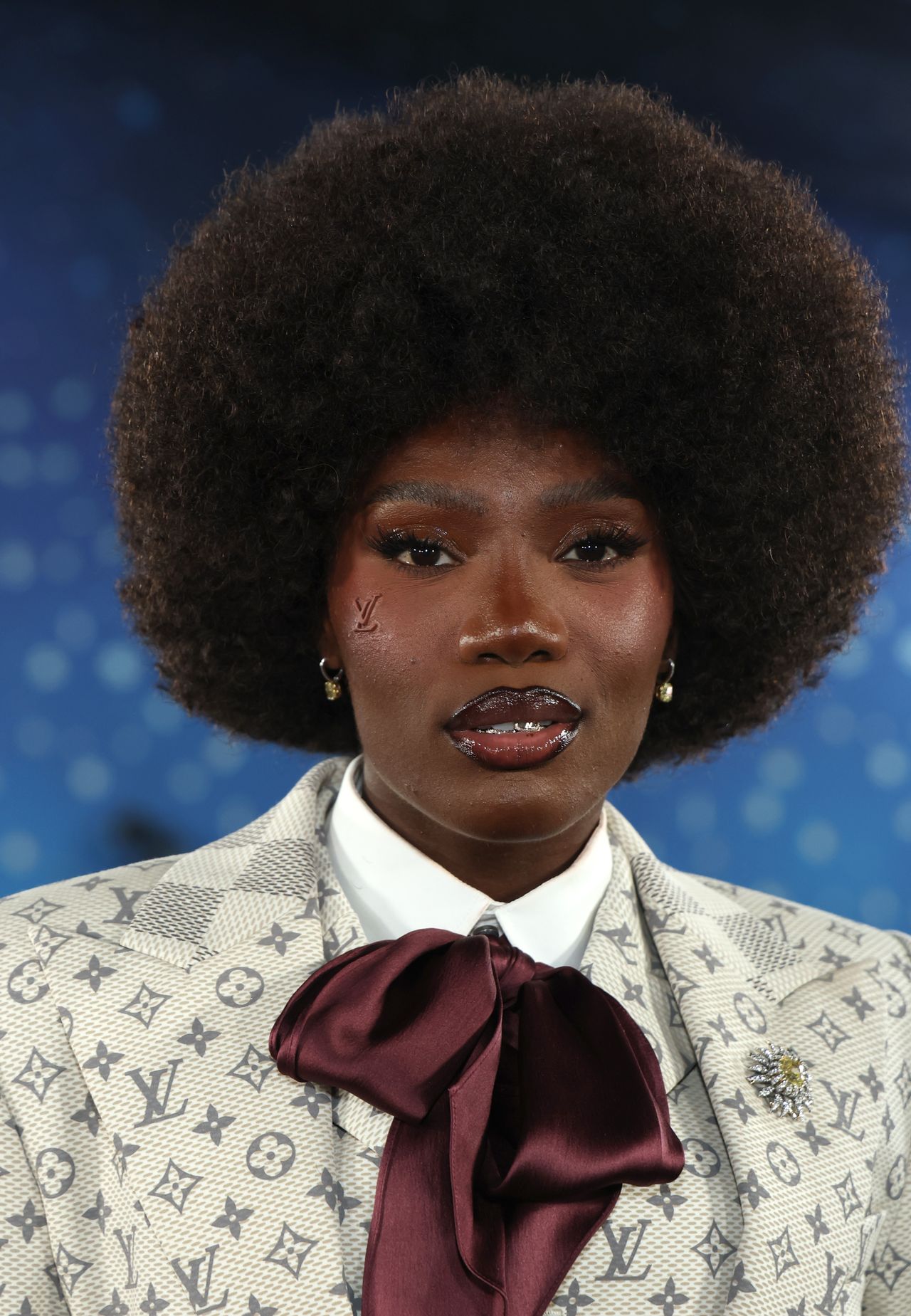 See the Details on Doechii's LV Face Stamp at the Met Gala | Who What Wear