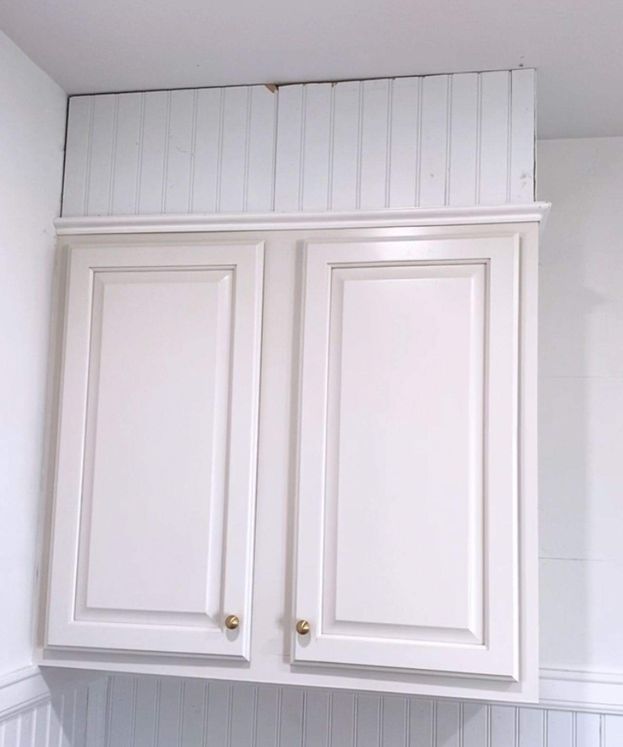 Before and after: faux upper cabinets create lofty laundry room space ...