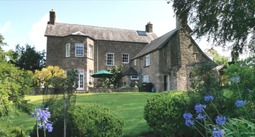A fully-reinstated 18th century mansion, with an ornamental lake with ...