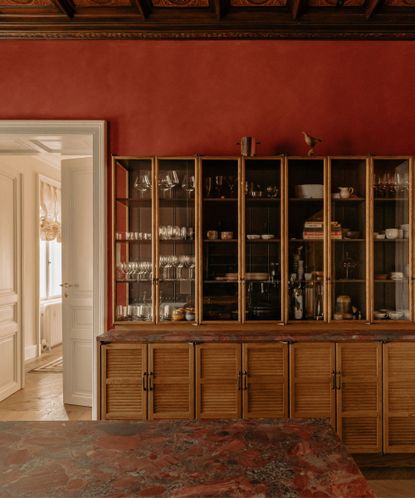 Tour this wooden kitchen with unexpected paprika red walls | Homes and ...