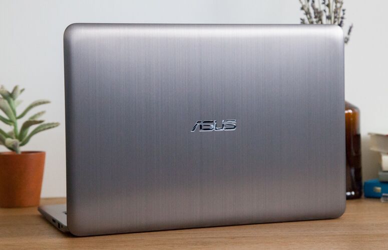 Asus VivoBook E403NA Review: Ultraportable Value to Beat | Laptop Mag