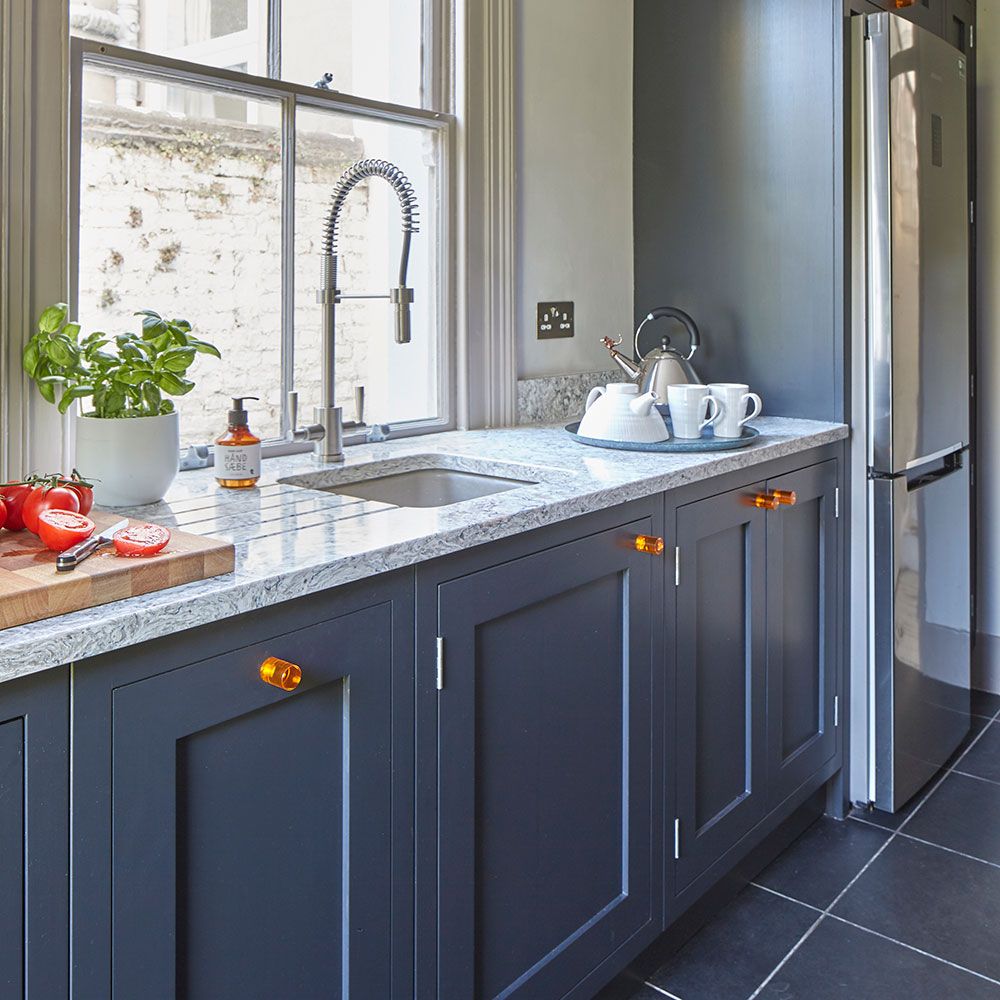Kitchen makeover with dark blue units and walnut worktops | Ideal Home