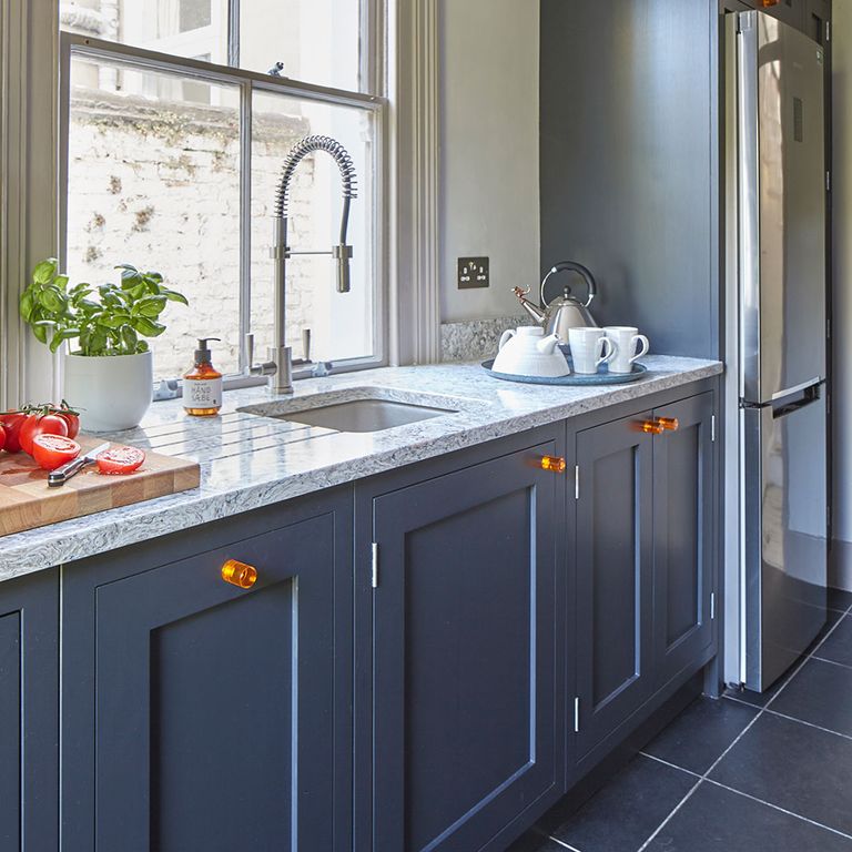 Kitchen makeover with dark blue units and walnut worktops | Ideal Home