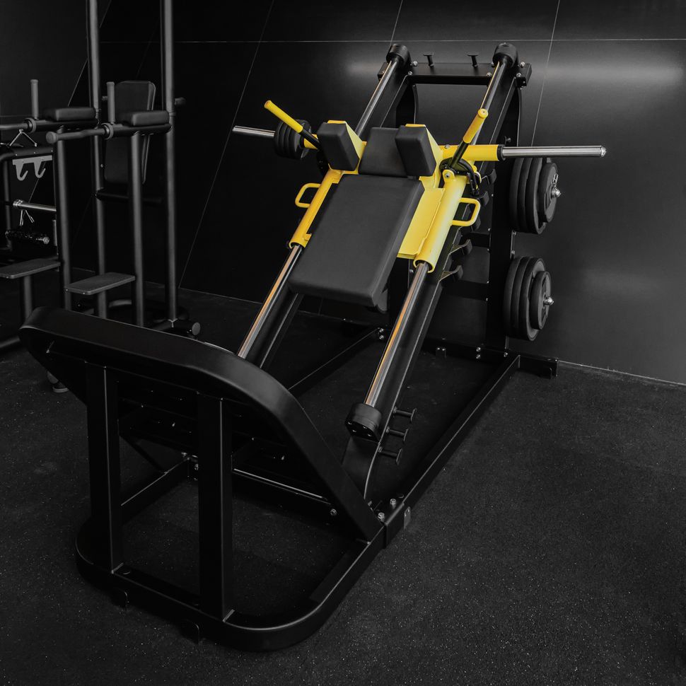 How To Do The Hack Squat—Barbell And Resistance Machine Variations ...