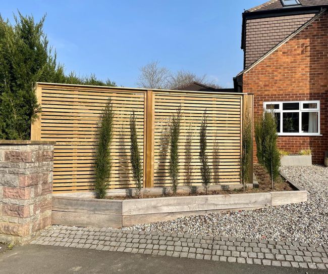 15 driveway fencing ideas to elevate your entrance | Homebuilding