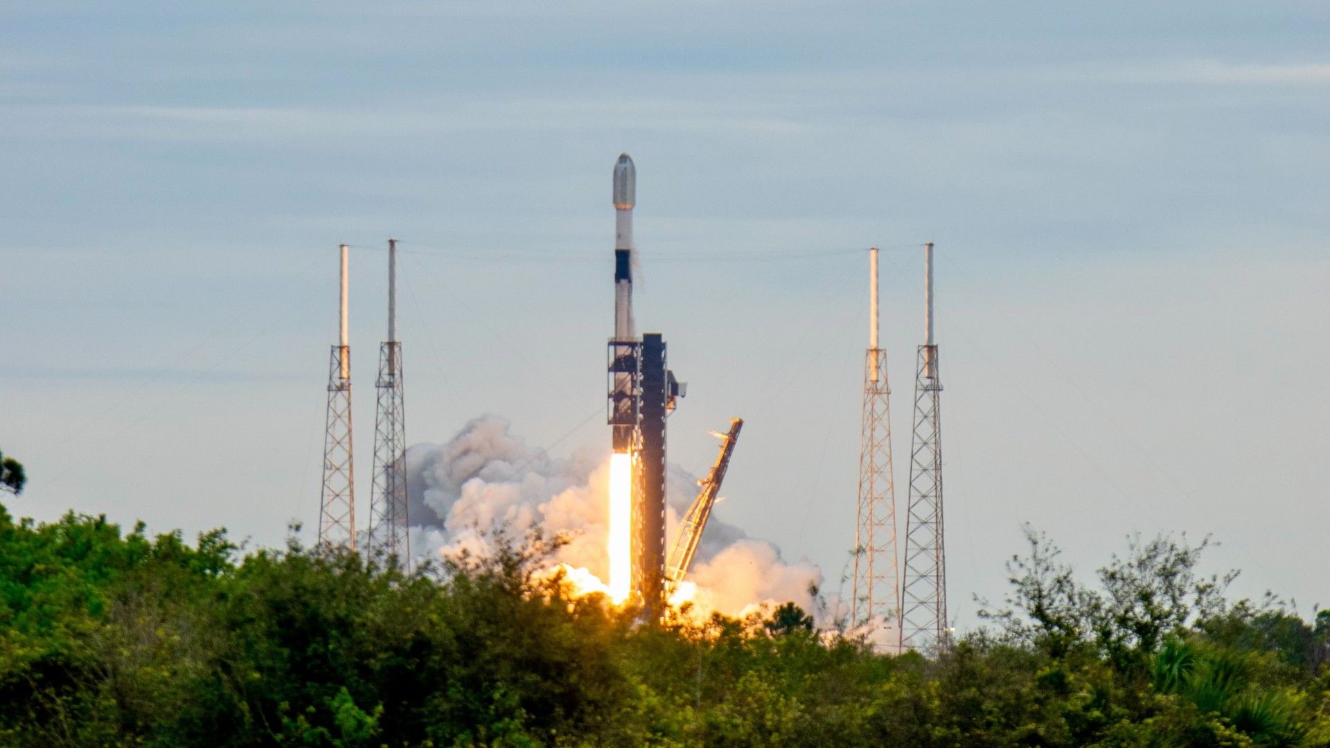 SpaceX launches 21 Starlink satellites from Florida, lands booster for ...