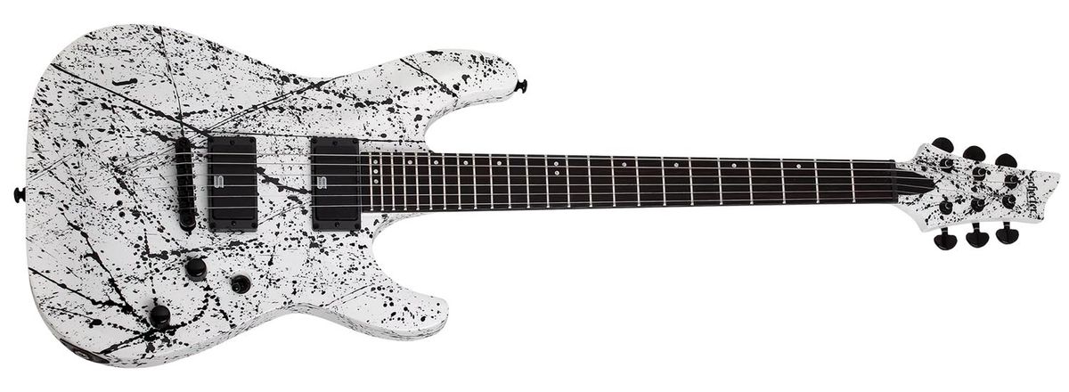 “Each C-1 Ink Bomb is uniquely hand-splattered, making every guitar a ...