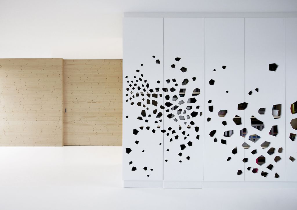 Deliberate holes are the only decorative feature in this minimalist ...