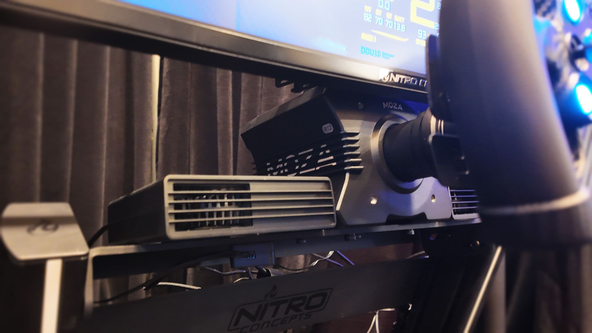 I tried a sim racing rig that generates 'wind' at CES 2025 and it's ...
