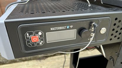 Masterbuilt AutoIgnite 545 review: the smarter charcoal grill and ...