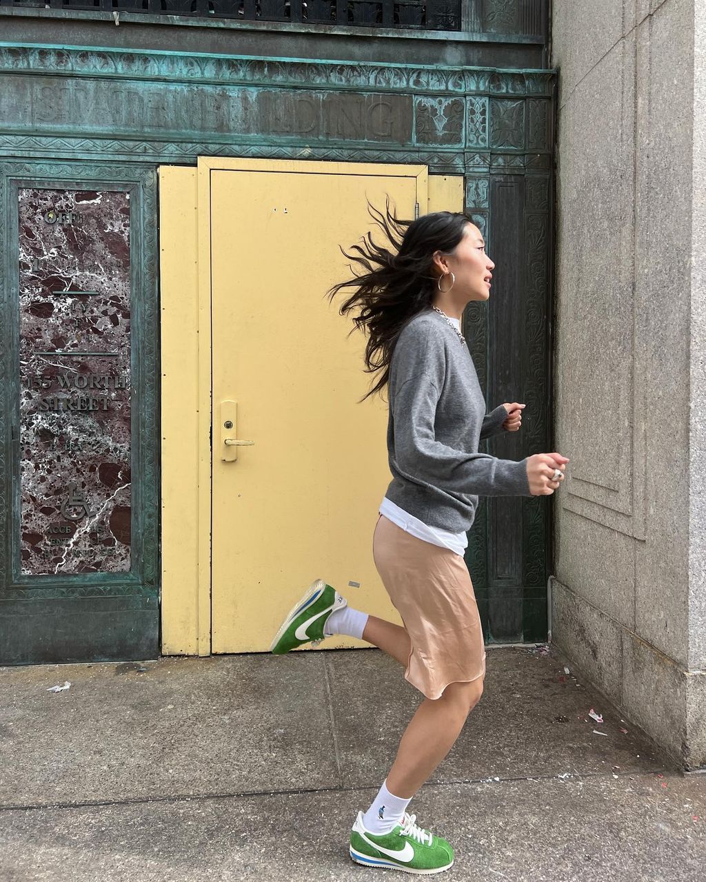 How to Wear Miniskirts and Sneakers This Spring | Who What Wear