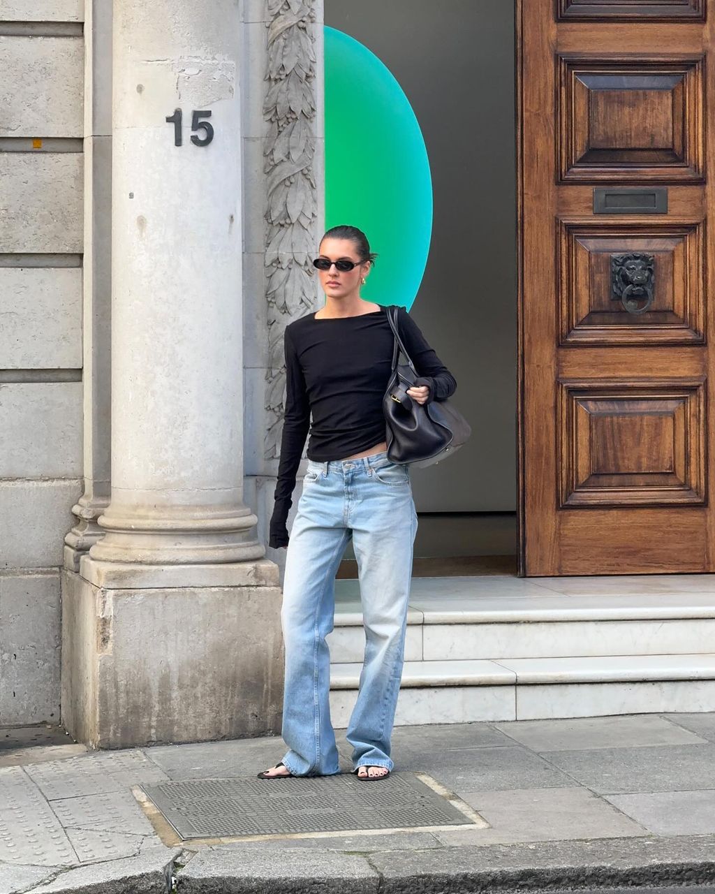 4 Simple Outfits That Look Chic Worn with Black Flip-Flops | Who What Wear