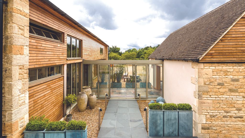 Glass Link Extensions: 10 Ways to Get This Feature Right | Homebuilding