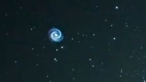 Eerie blue spiral in night sky over Hawaii spawned by SpaceX rocket | Space